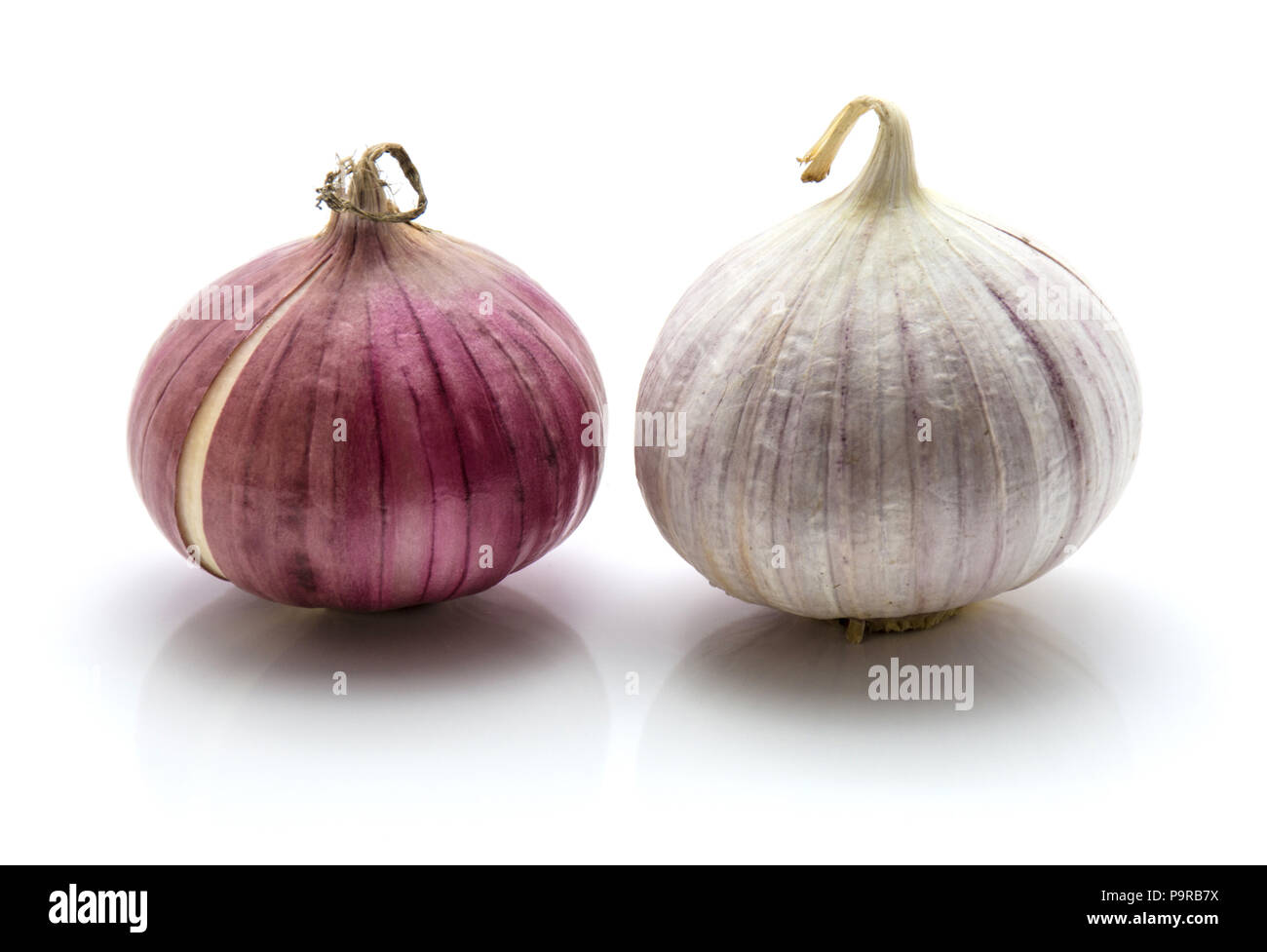 Two single clove solo pearl garlic isolated on white background Stock ...