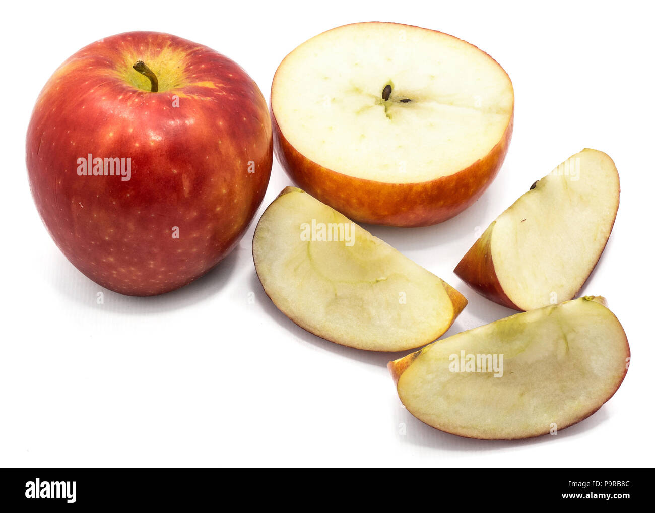Sliced apples Kanzi, one whole, cross section half, slices, isolated on ...
