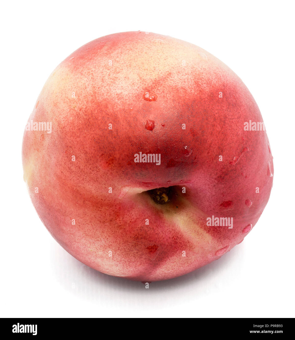 One whole white nectarine isolated on white background Stock Photo - Alamy