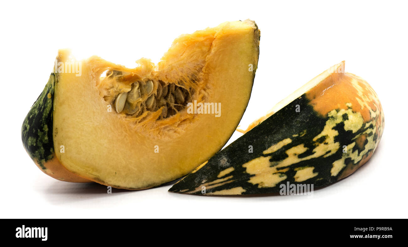 Two spotty green yellow pumpkin slices with seeds isolated on white ...