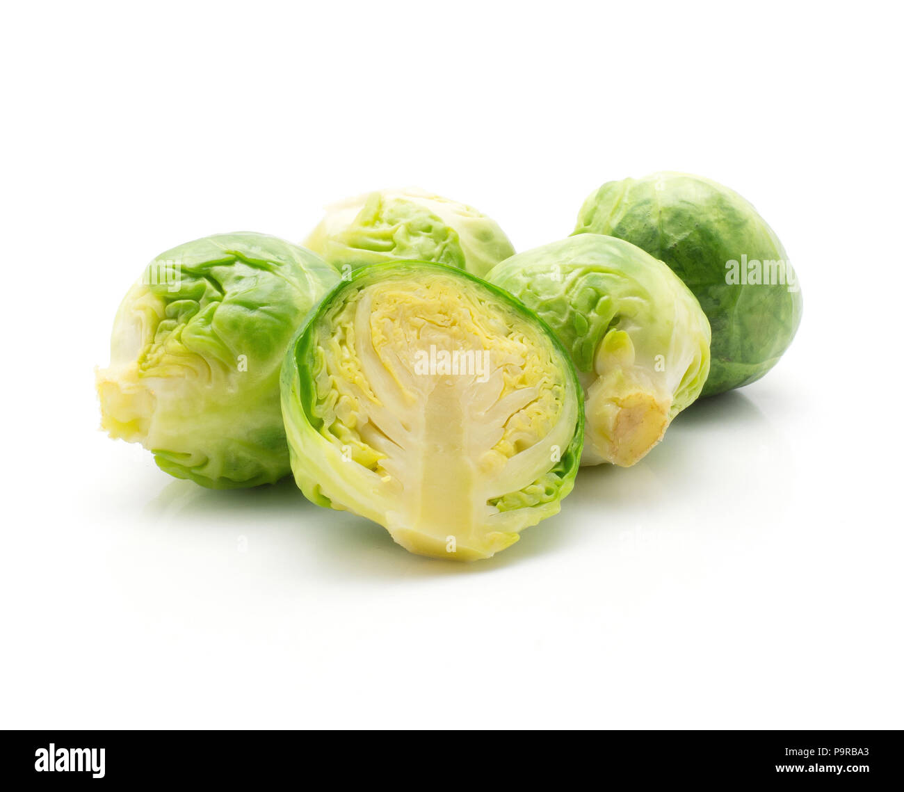 Boiled Brussels sprout set of four whole heads and one cross section ...