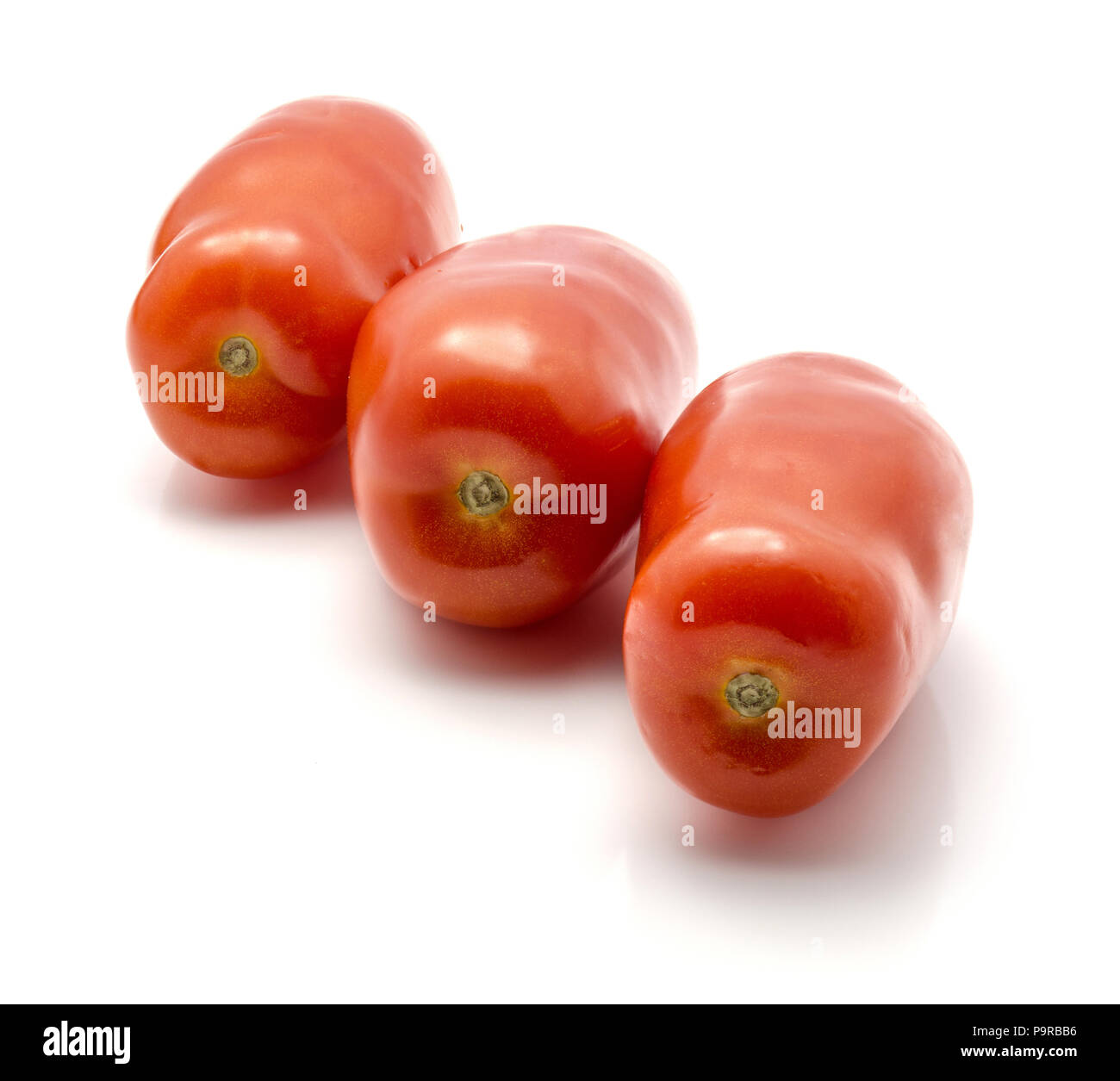 Ripe San Marzano tomato isolated on white background three whole red ...
