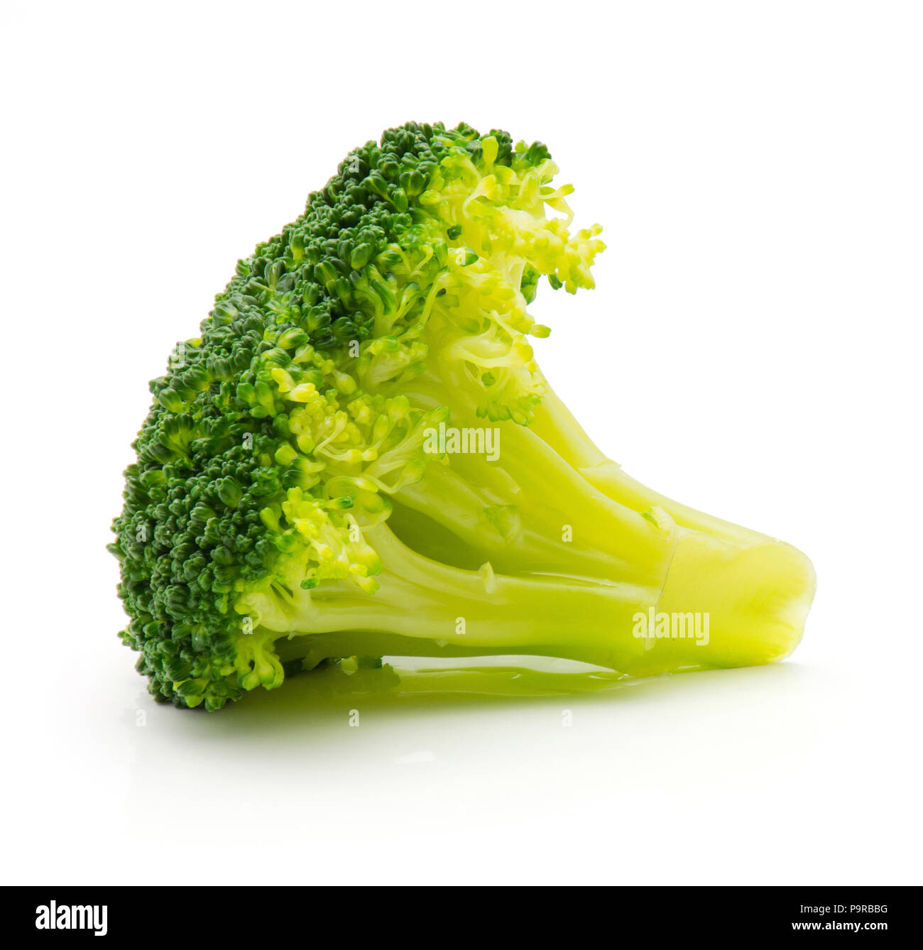 Steamed broccoli isolated on white background one piece Stock Photo - Alamy