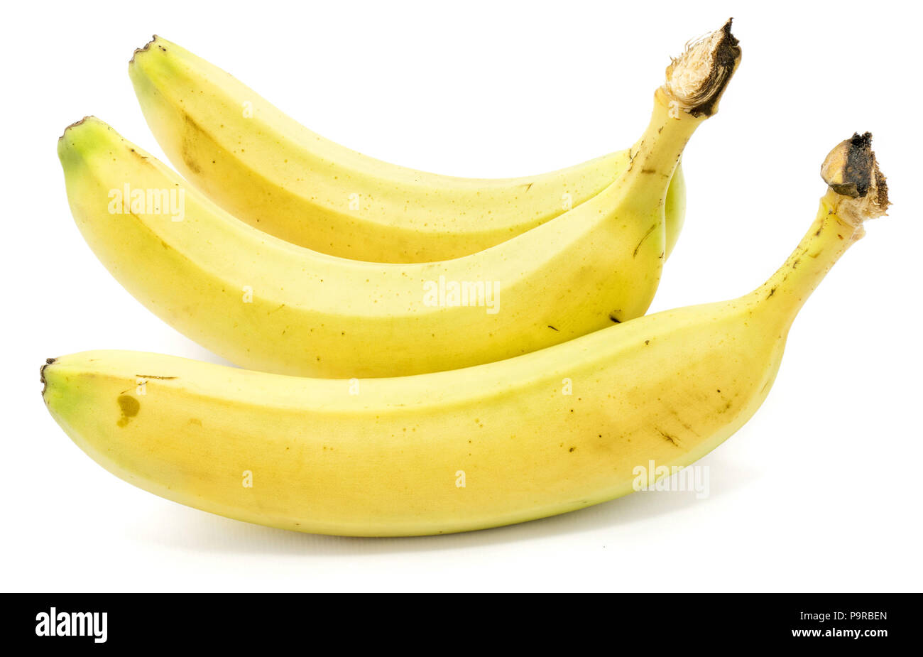 Three whole bananas isolated on white background Stock Photo - Alamy