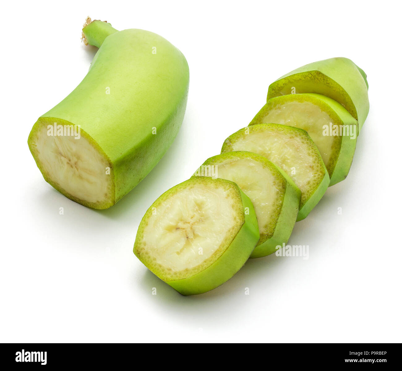 Sliced plantain and one half isolated on white background green banana ...