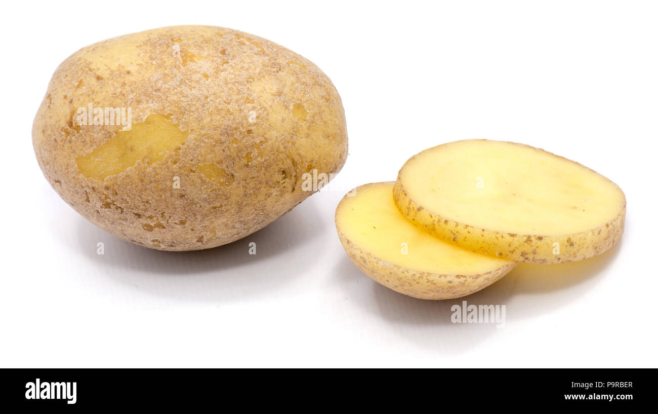 One whole potato and two slices isolated on white background Stock ...