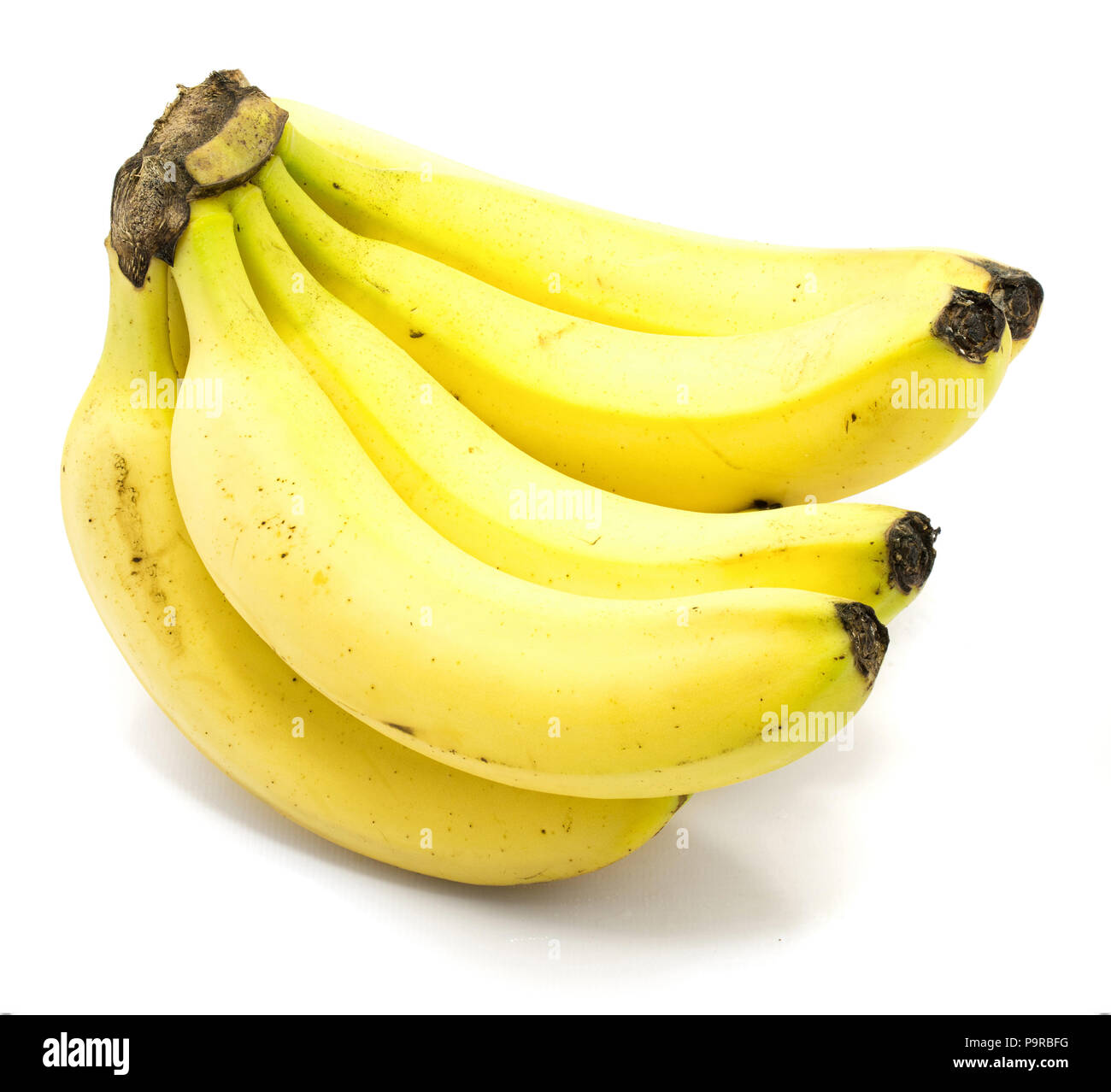 Yellow banana cluster isolated on white background Stock Photo - Alamy