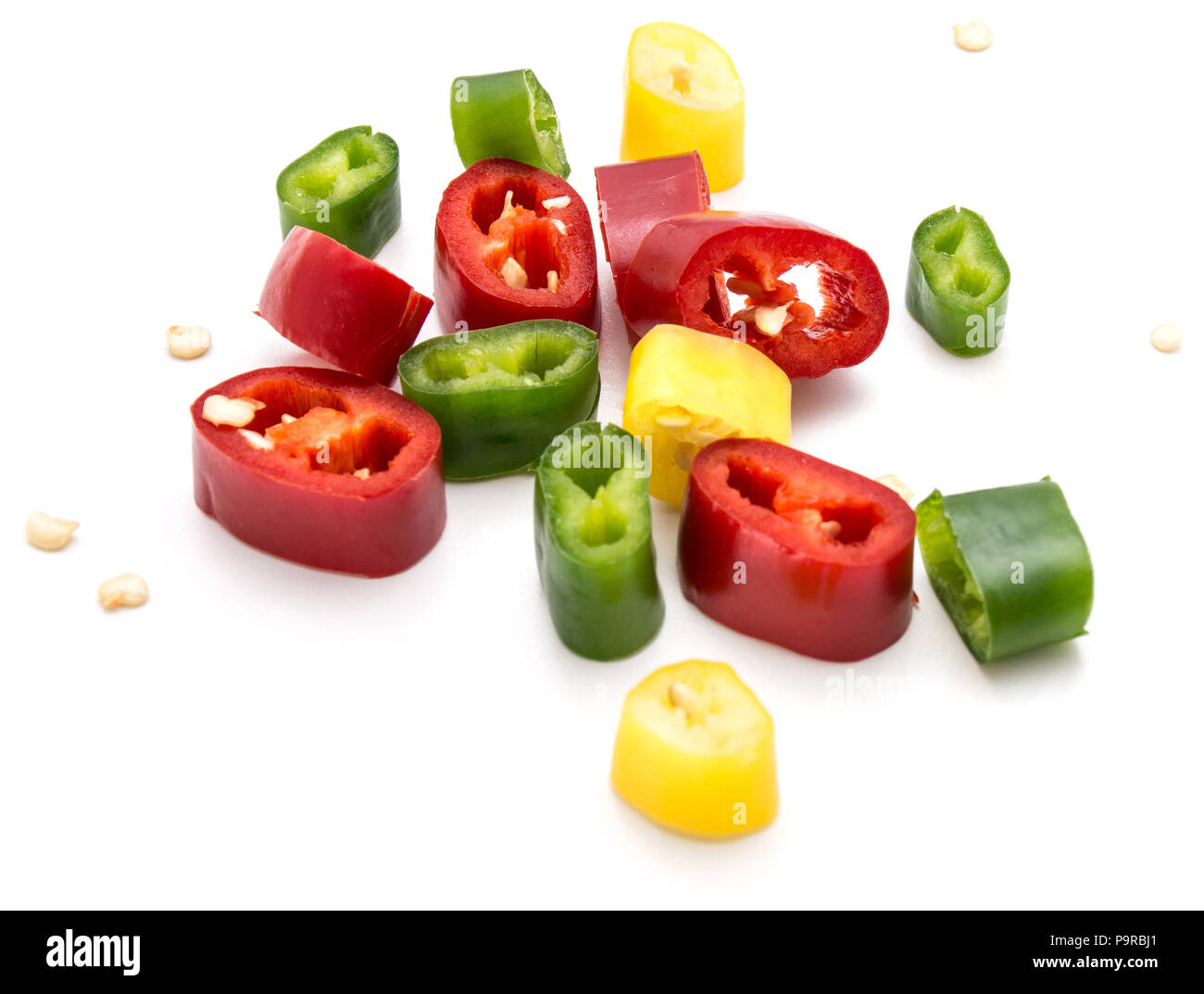 Sliced Chilli pepper isolated on white background three colors ...