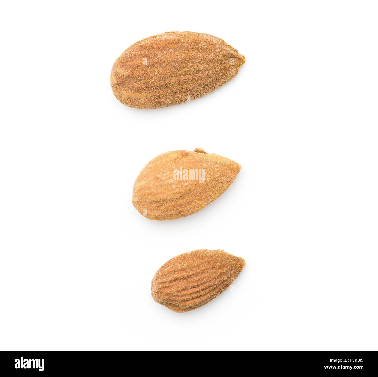 Three almonds top view isolated on white background shelled nuts Stock ...