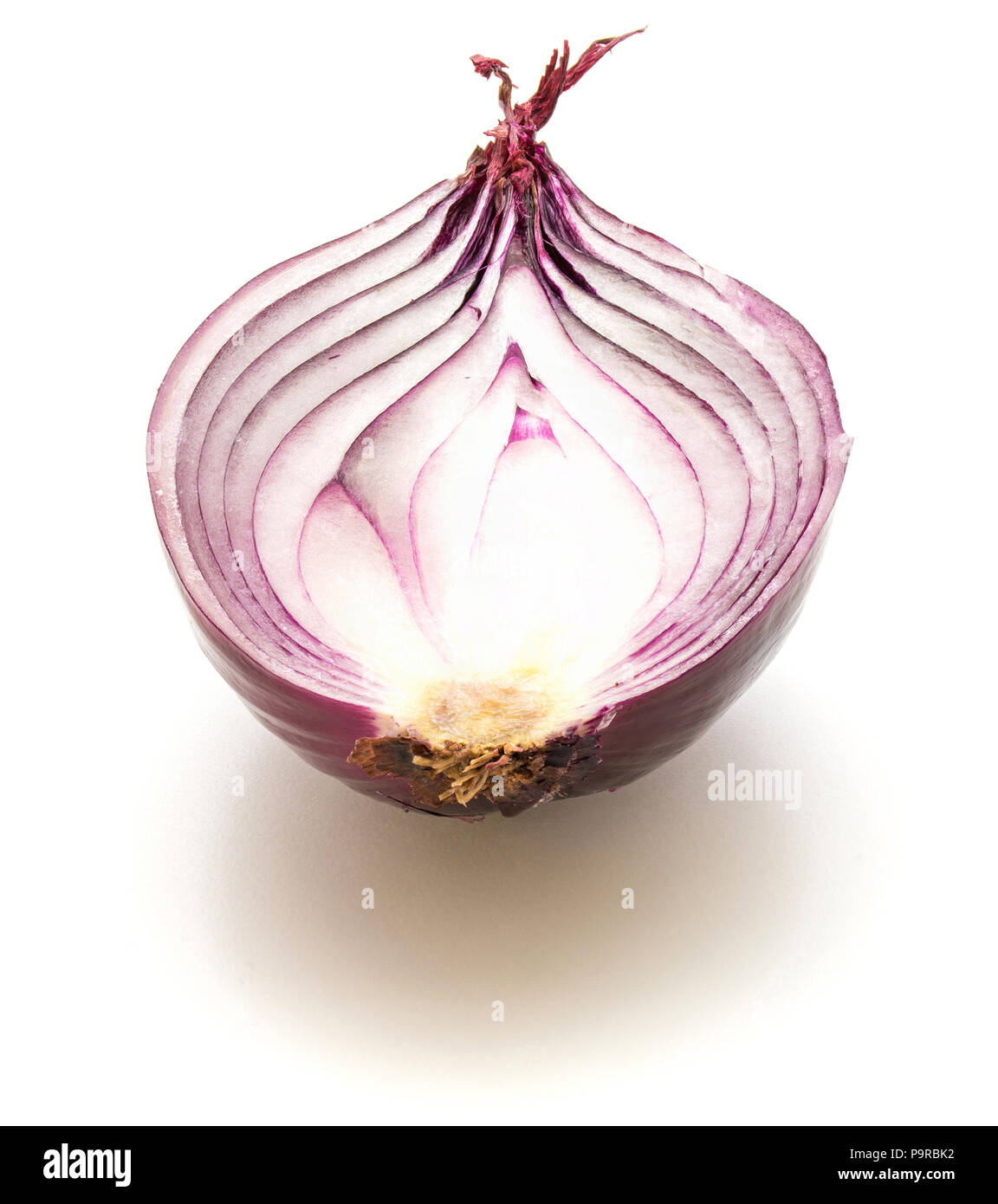 Raw red onion half isolated on white background Stock Photo - Alamy