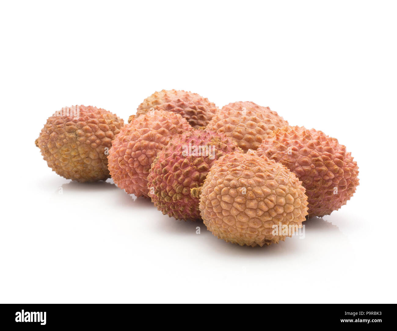 Lychee isolated on white background receding ripe pink fresh berries ...