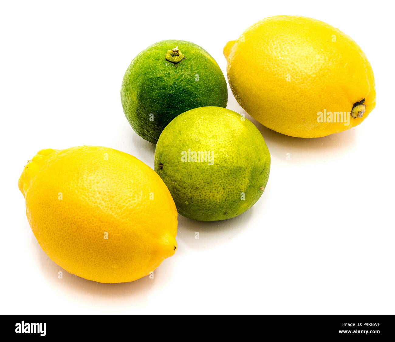 Group of pair whole lemon and limes isolated on white background Stock ...