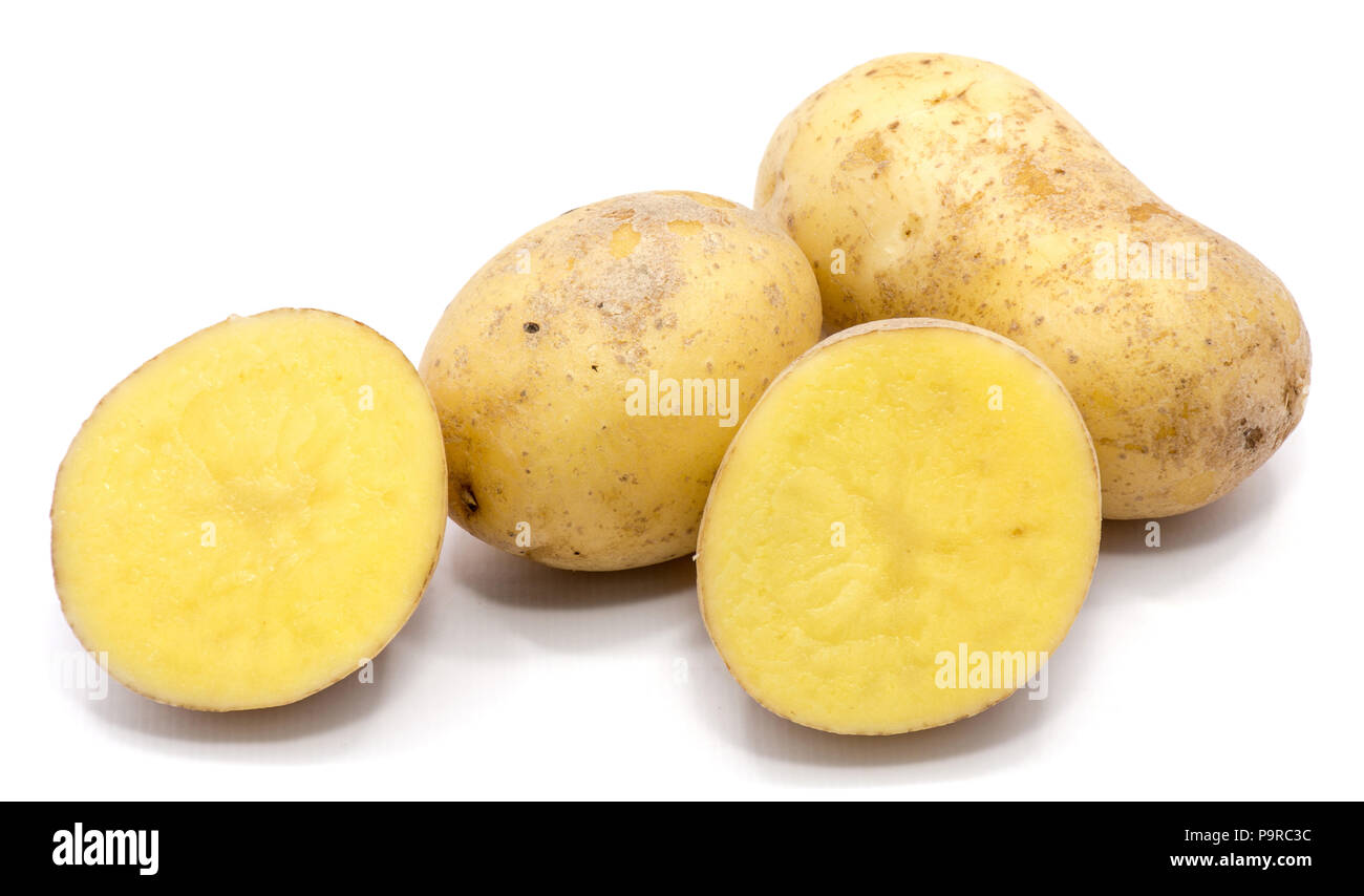 Two whole potatoes and two halves isolated on white background Stock ...