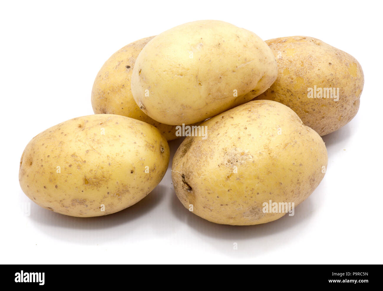 Group of whole potatoes isolated on white background Stock Photo - Alamy