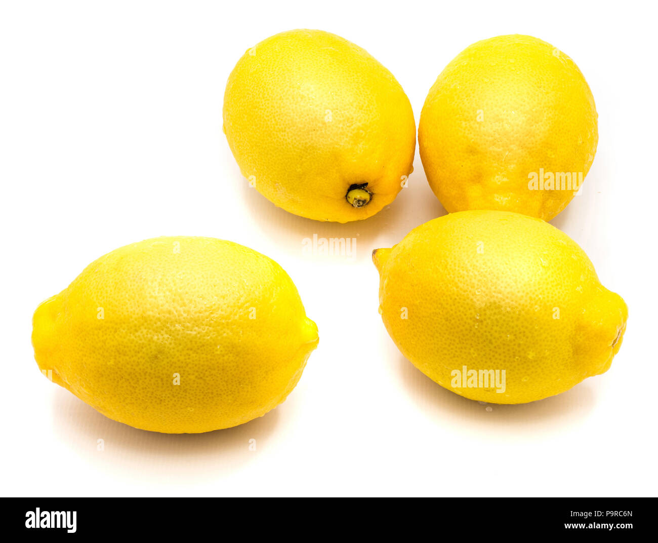 Group of four whole yellow lemons isolated on white background Stock ...