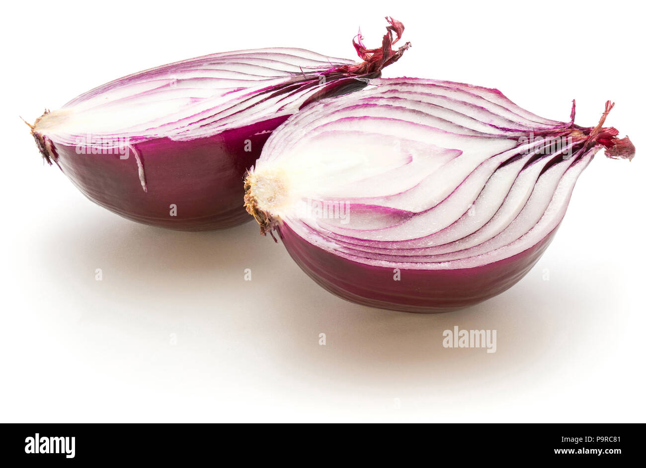 Two red onion halves isolated on white background Stock Photo - Alamy