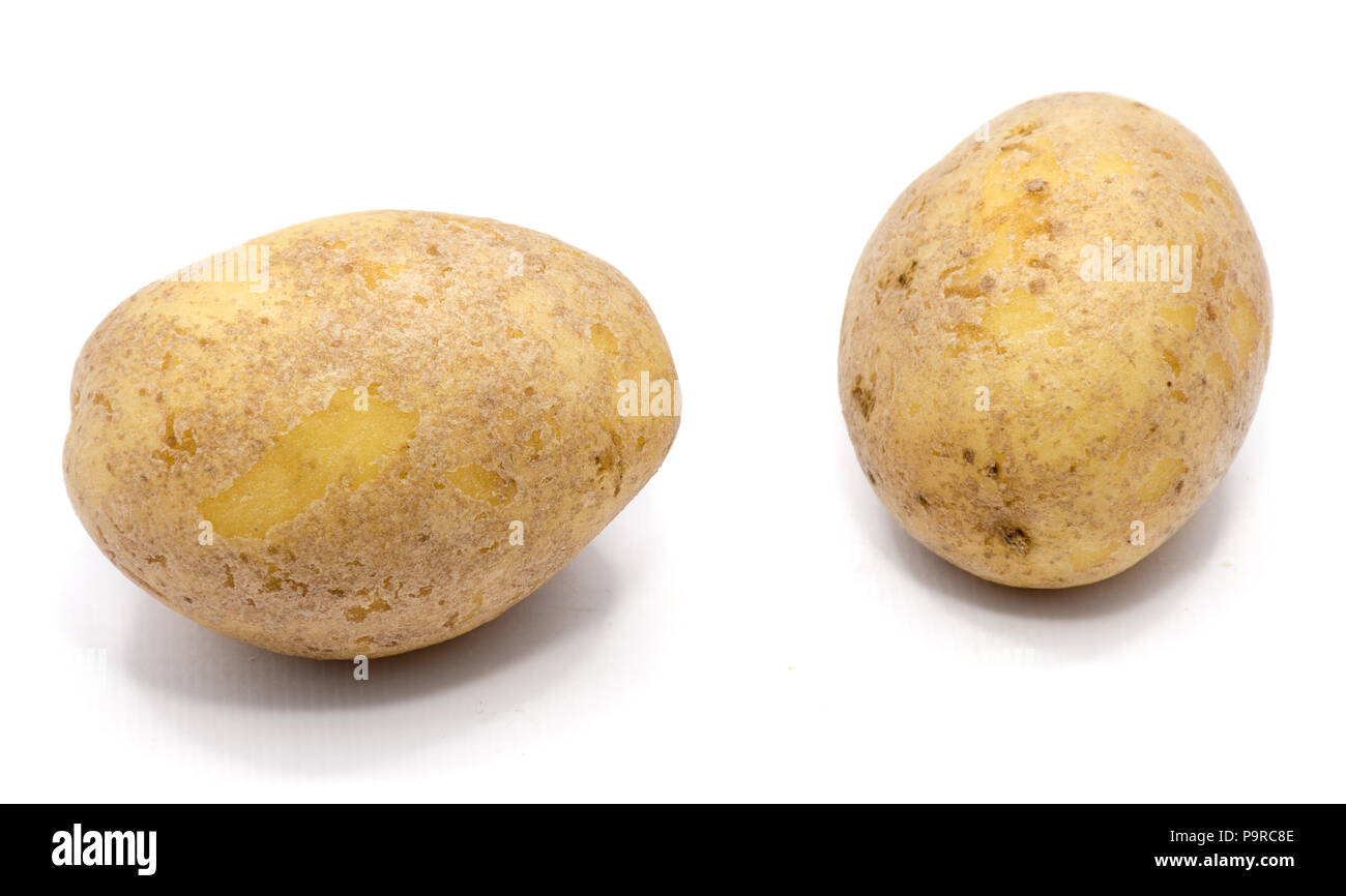Two whole potatoes isolated on white background Stock Photo - Alamy