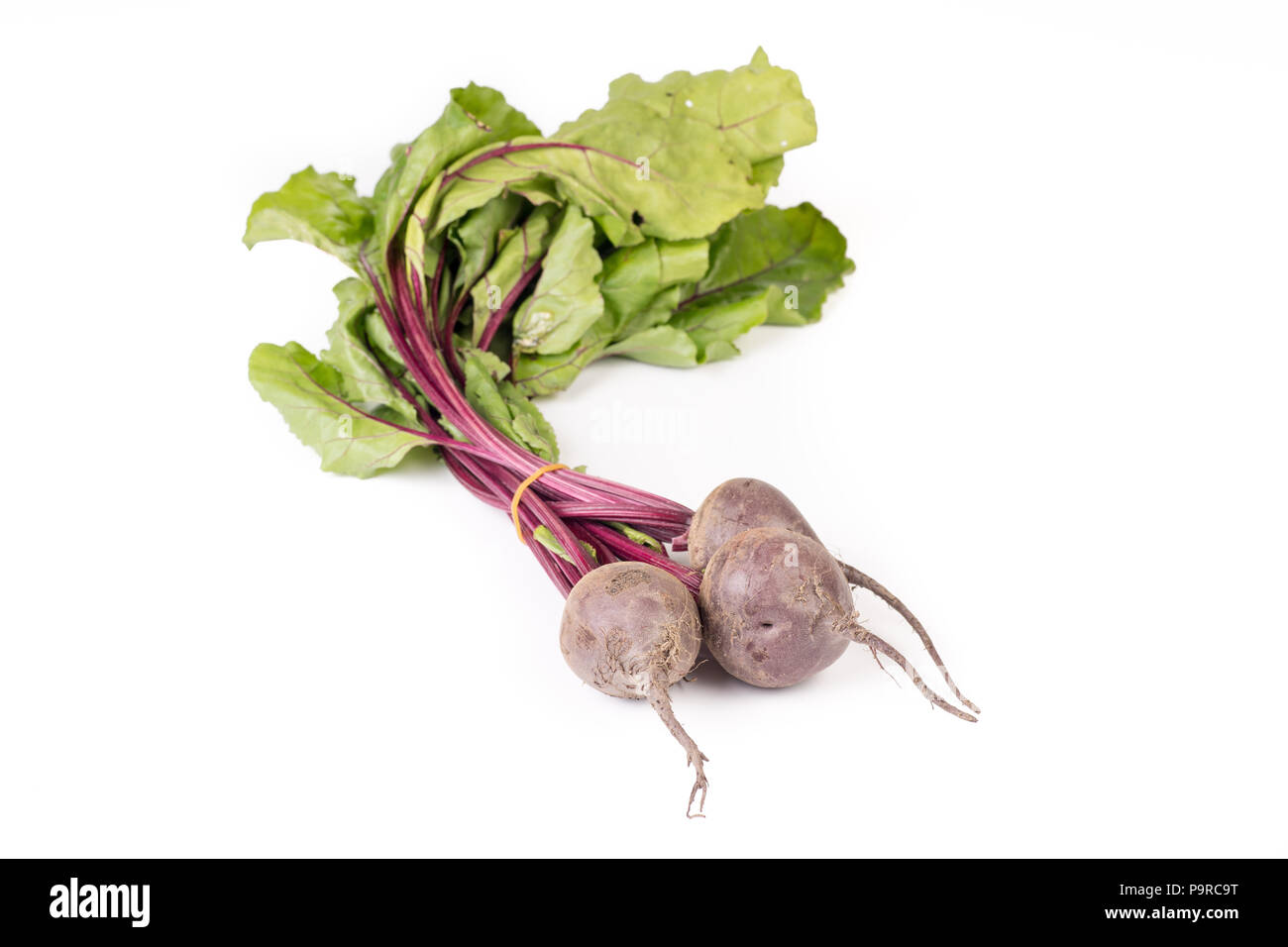 Bunch of organic beetroot isolated on white background Stock Photo - Alamy