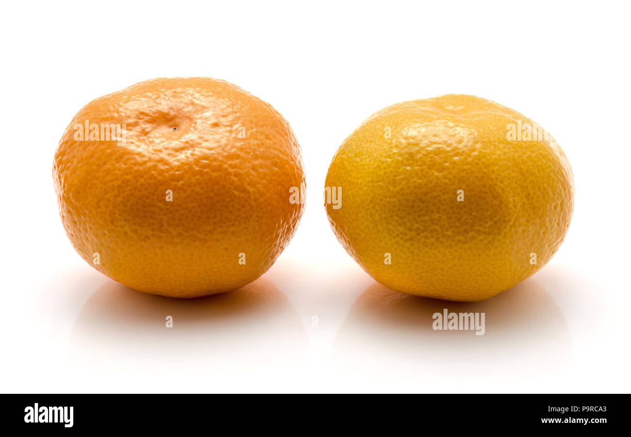 Two tangerines isolated on white background Stock Photo - Alamy