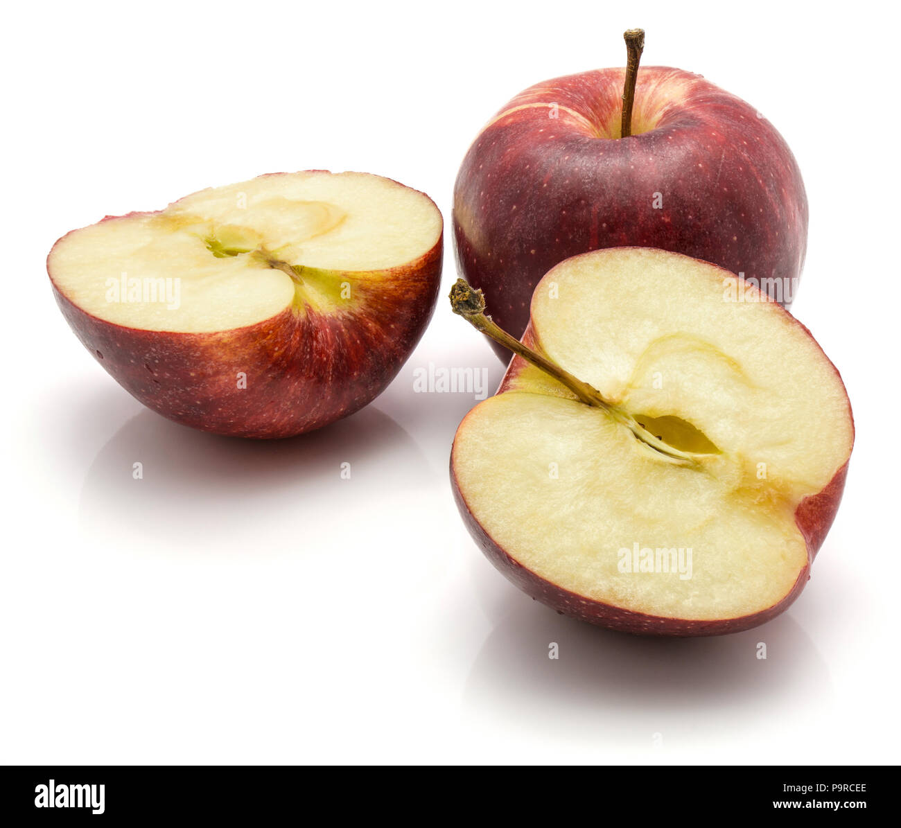 Gala apple, one whole and two halves, isolated on white background ...