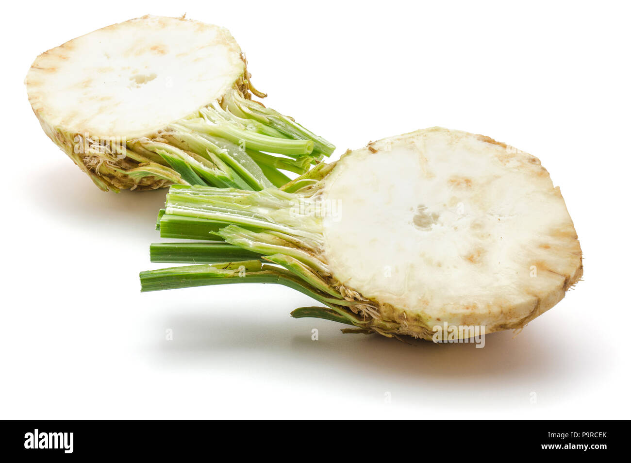 Sliced fresh celery root isolated on white background two halves cross ...