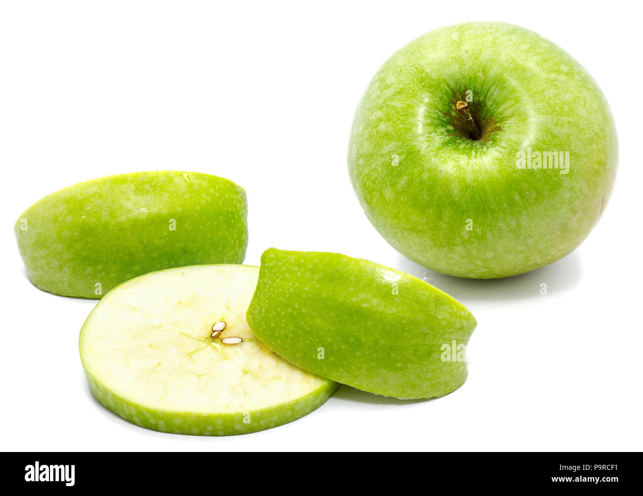 Granny Smith, one whole apple, one circle and two slices, isolated on ...
