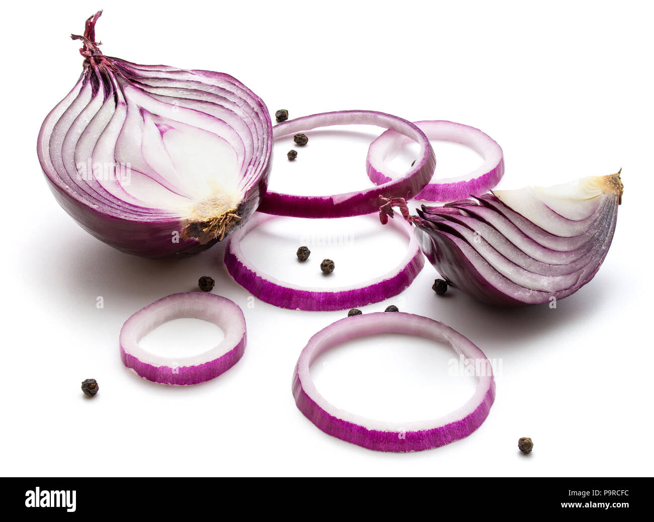 One half, quarter and red onion rings with black pepper, isolated on ...