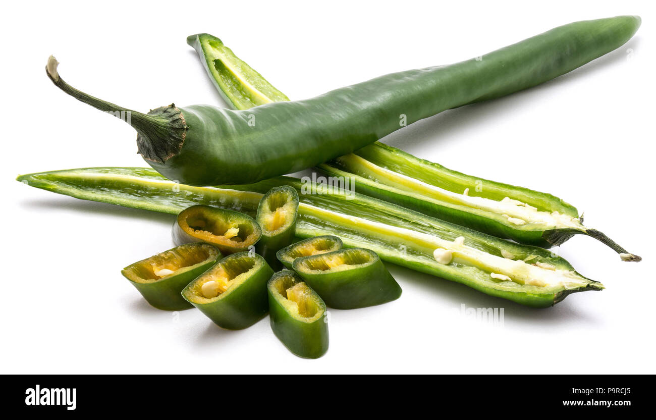 One whole green Chili pepper, two halves and slices isolated on white ...