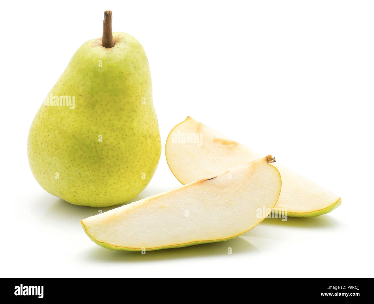 Green pear and two slices isolated on white background Stock Photo - Alamy