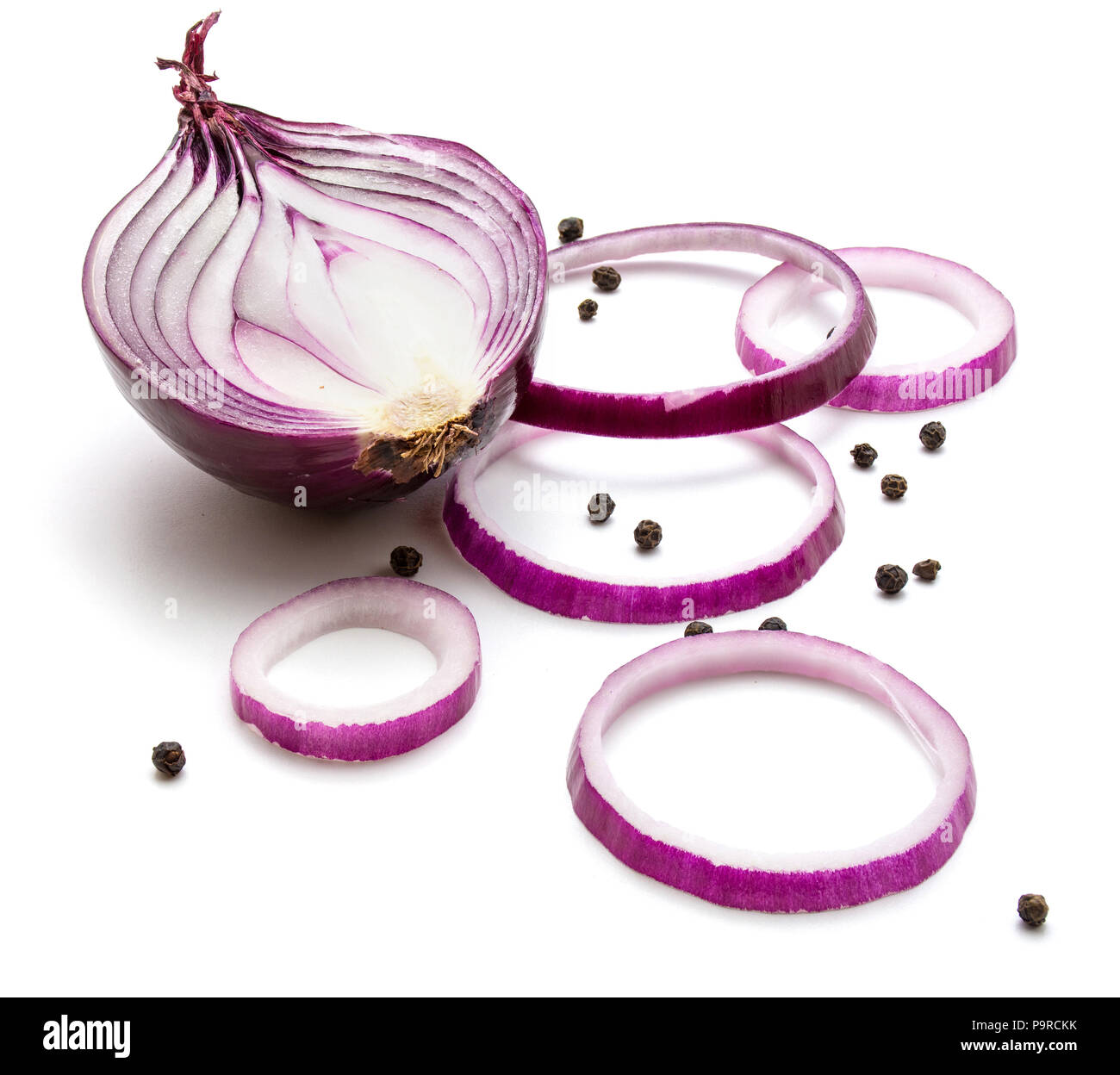 Sliced red onion rings, one half and black pepper, isolated on white ...