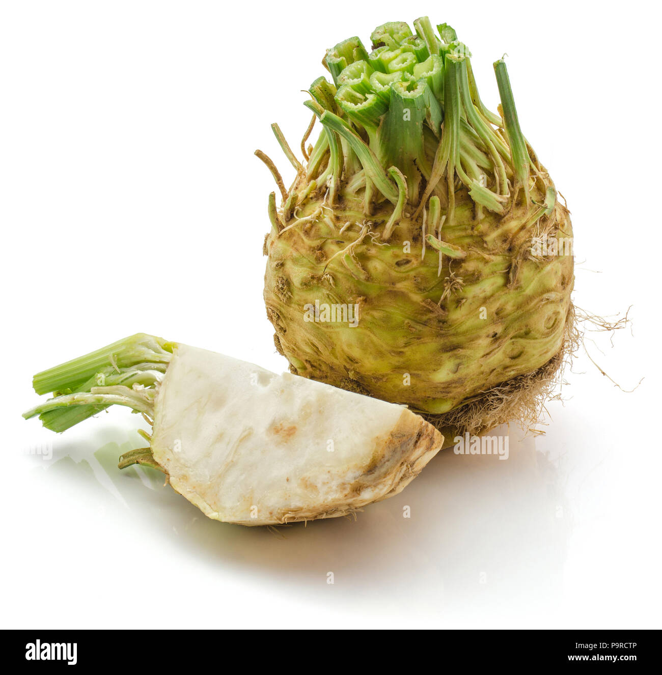 Fresh celery root isolated on white background one whole and one ...