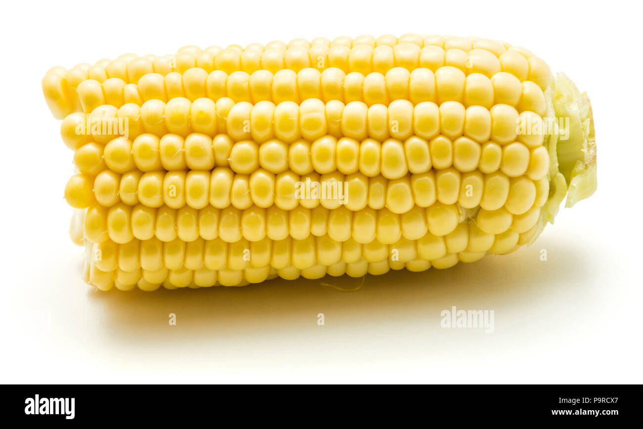 One half of broken open sweet corn isolated on white background Stock ...