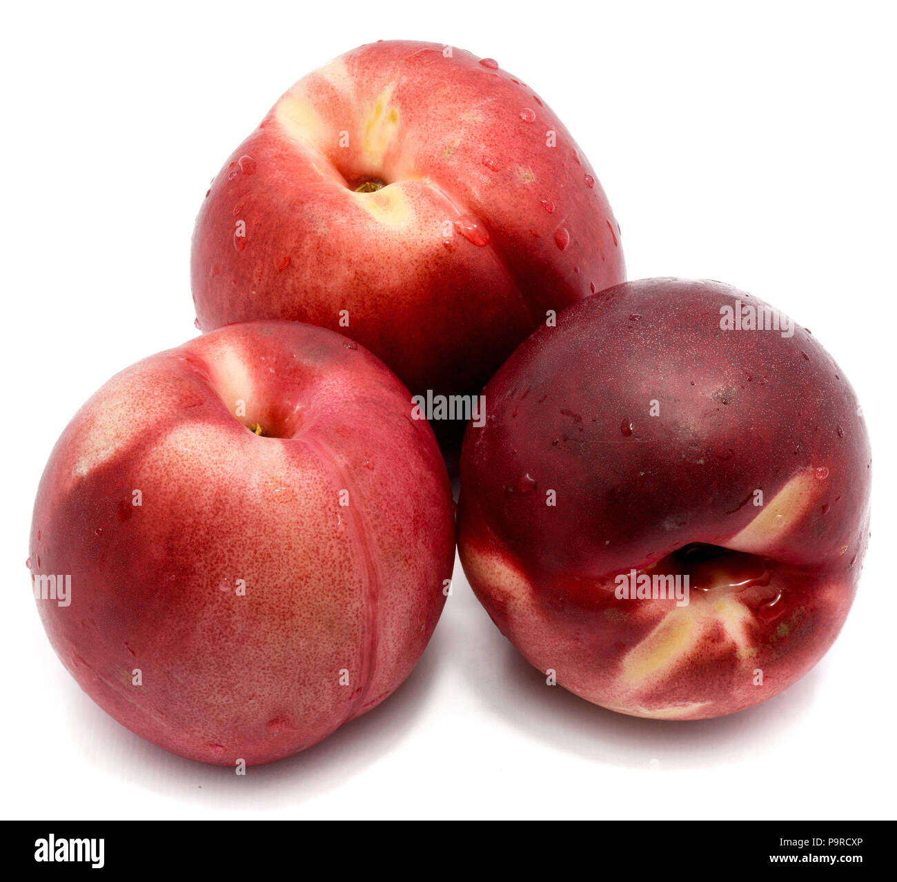 Three whole white nectarine isolated on white background Stock Photo ...