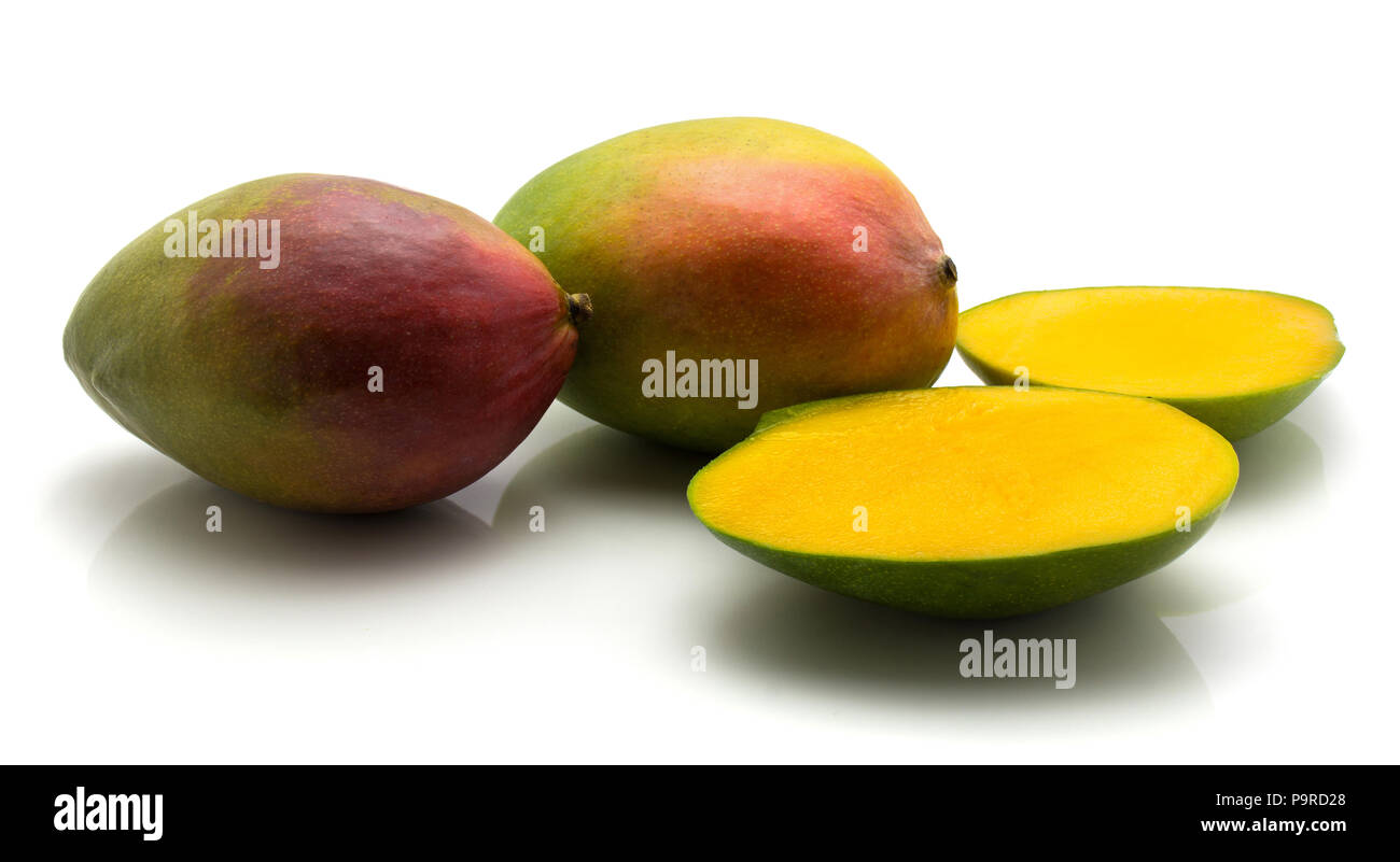 Mango isolated on white background two whole and two halves Stock Photo ...
