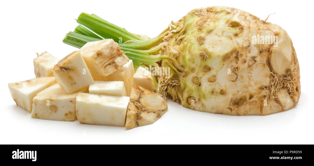 Sliced celery root pieces and one half isolated on white background ...