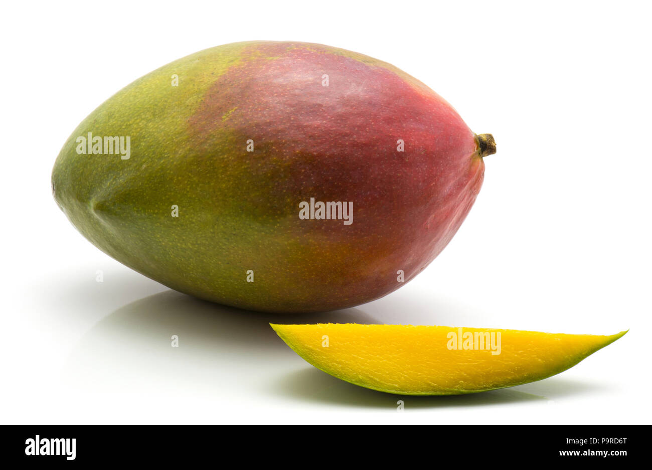 Mango isolated on white background one whole one slice Stock Photo - Alamy