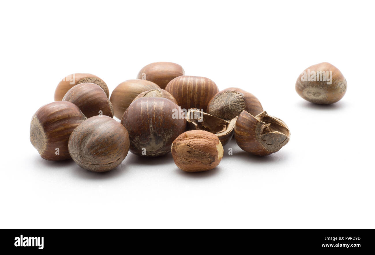 Hazelnut stack isolated on white background Stock Photo - Alamy