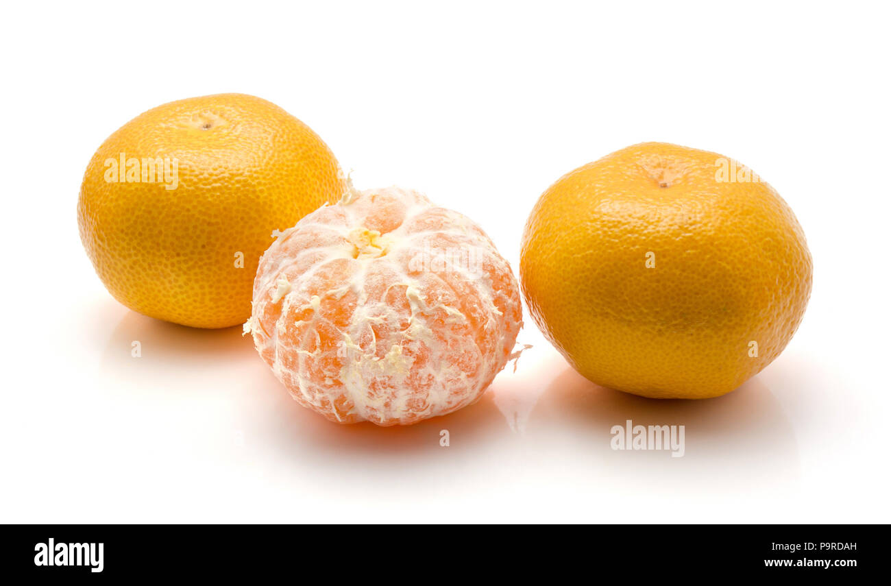 Three tangerines isolated on white background one peeled Stock Photo ...