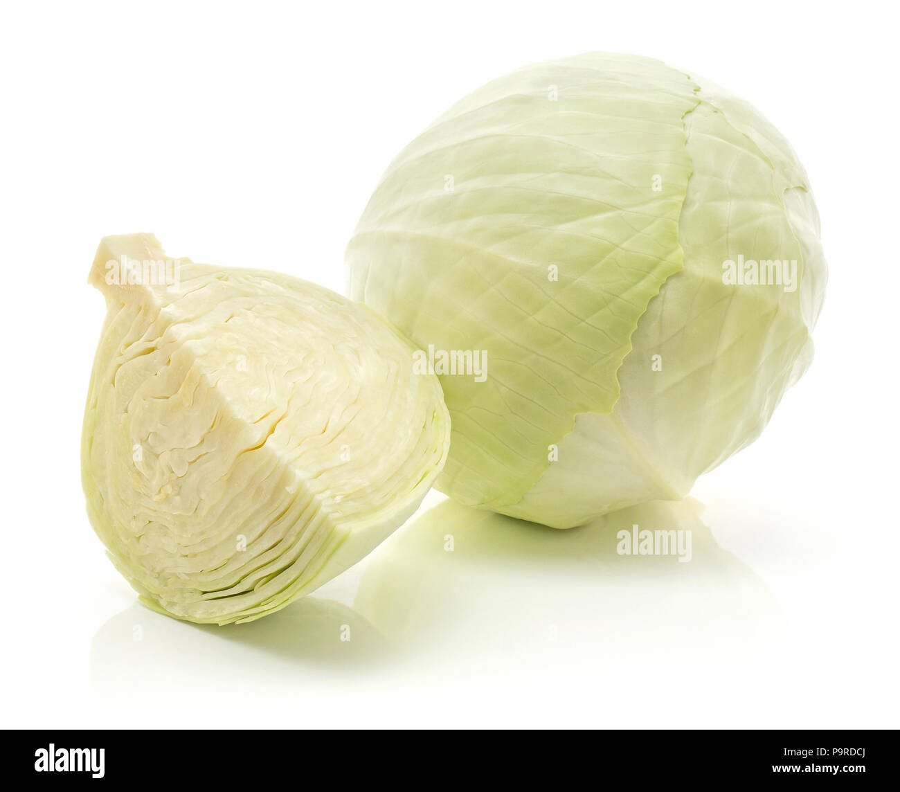 White cabbage isolated on white background one whole head and one ...