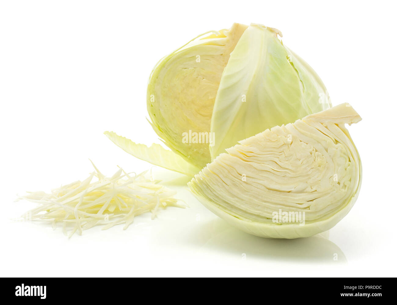 Chopped white cabbage and one cut open head with a quarter isolated on ...