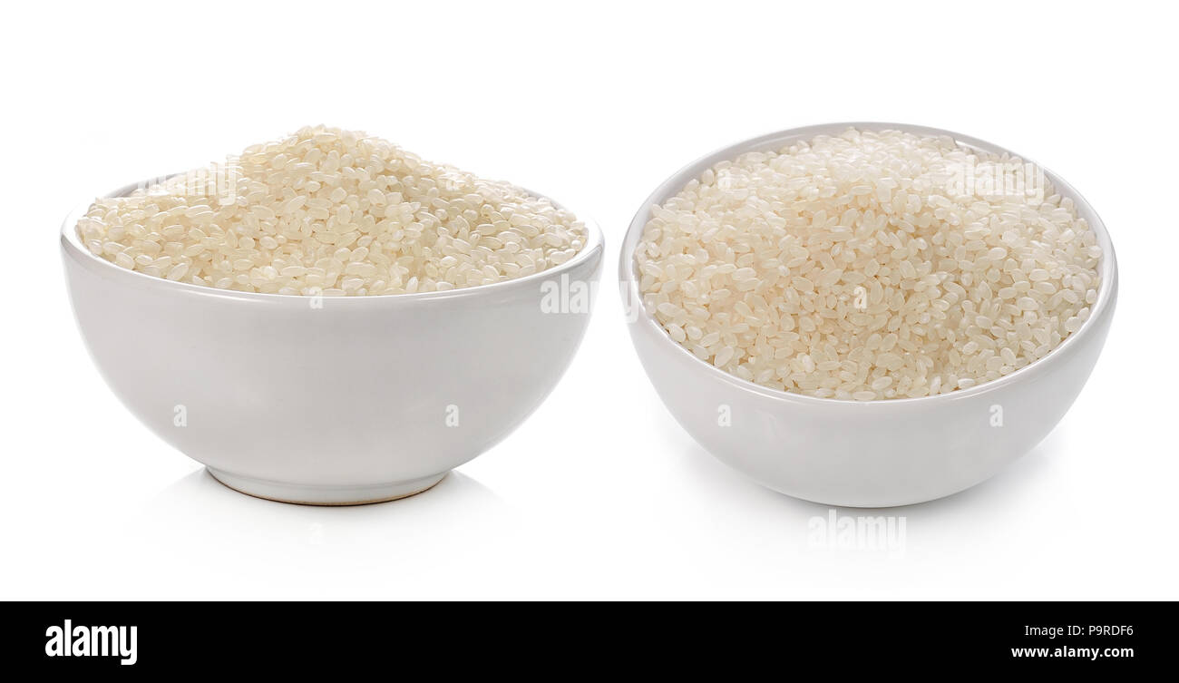 rice in a bowl isolated on white background Stock Photo - Alamy