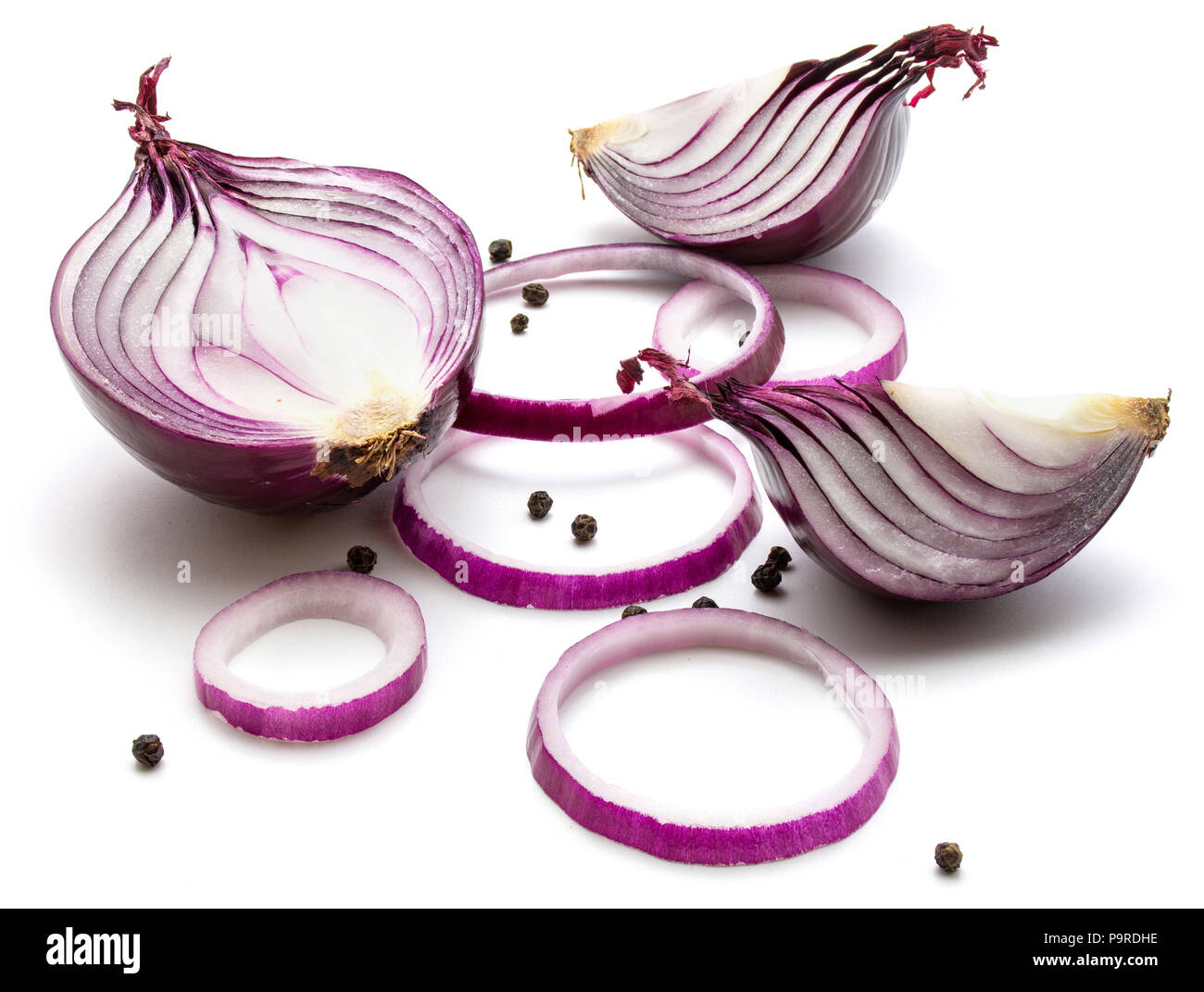 Sliced red onion rings, one half, two quarters and black pepper ...
