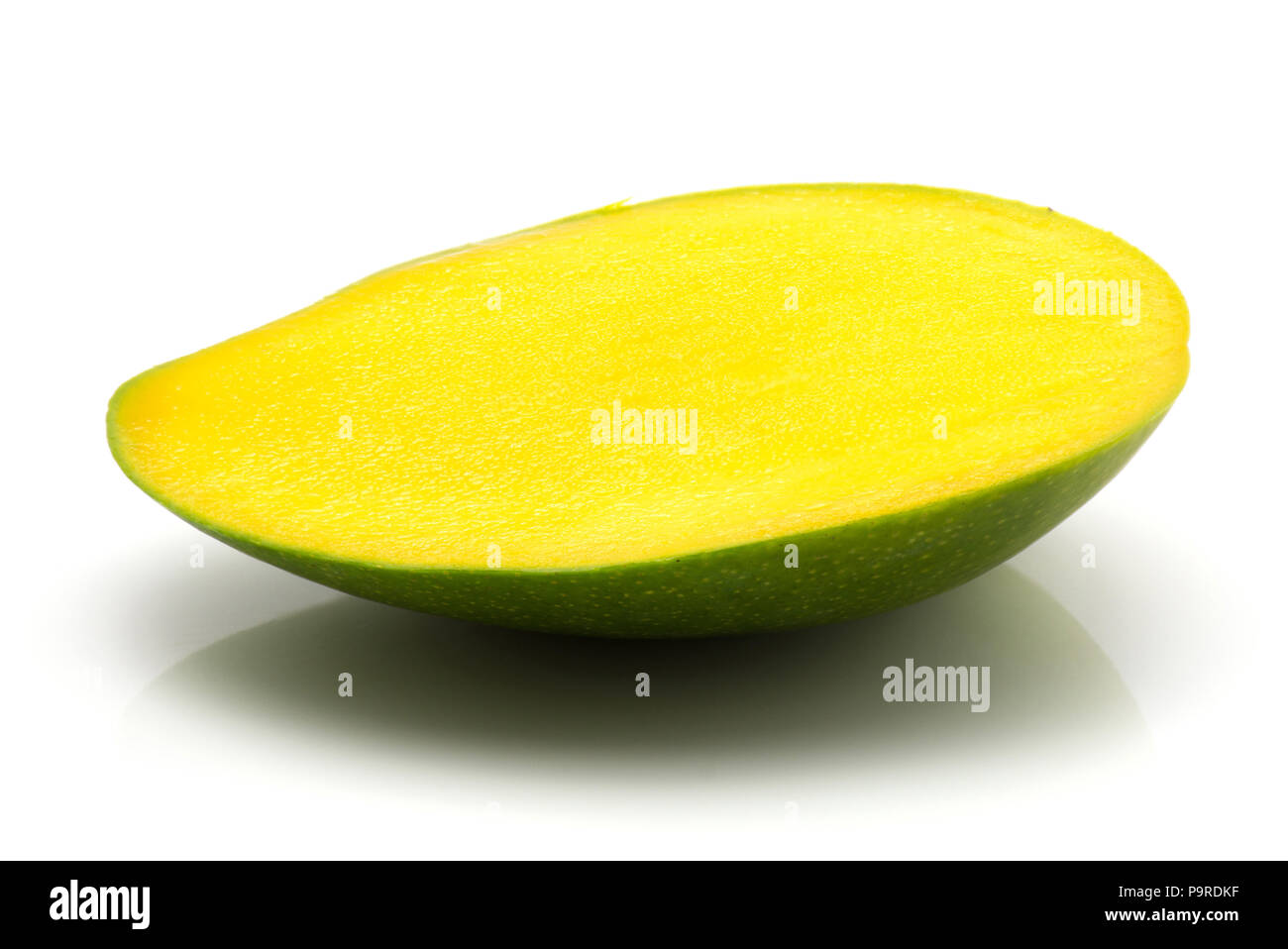 Sliced mango isolated on white background one half Stock Photo - Alamy