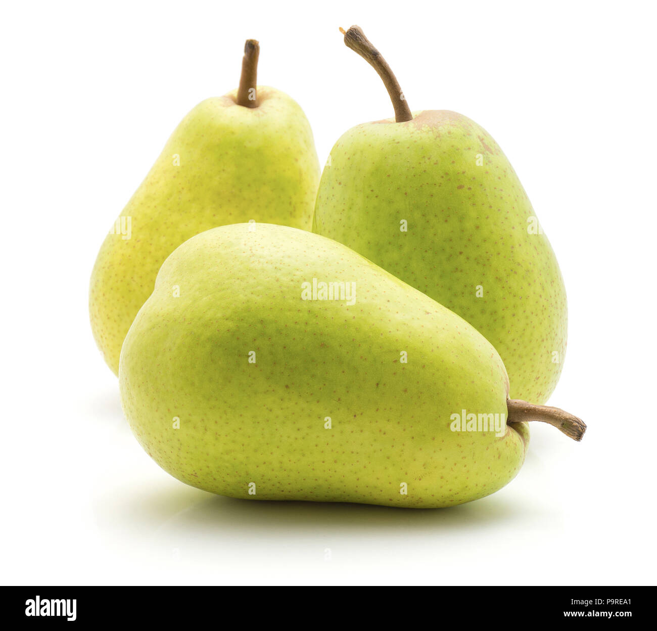 Three green pears isolated on white background Stock Photo - Alamy