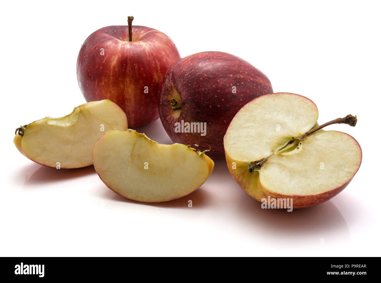 Gala apples, two whole, slices, cross section half, isolated on white ...