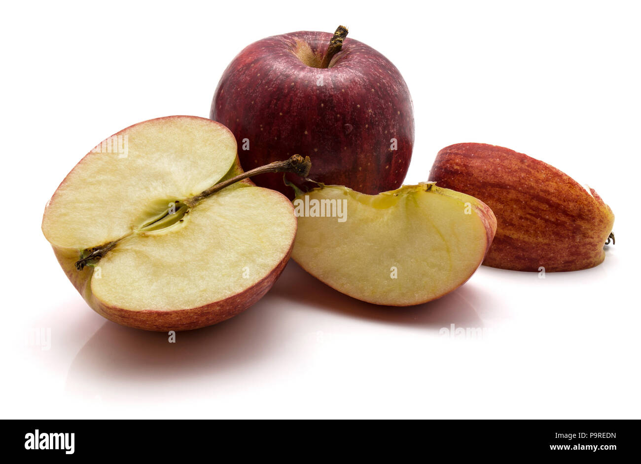 One whole, half and two slices of Gala apple, isolated on white ...