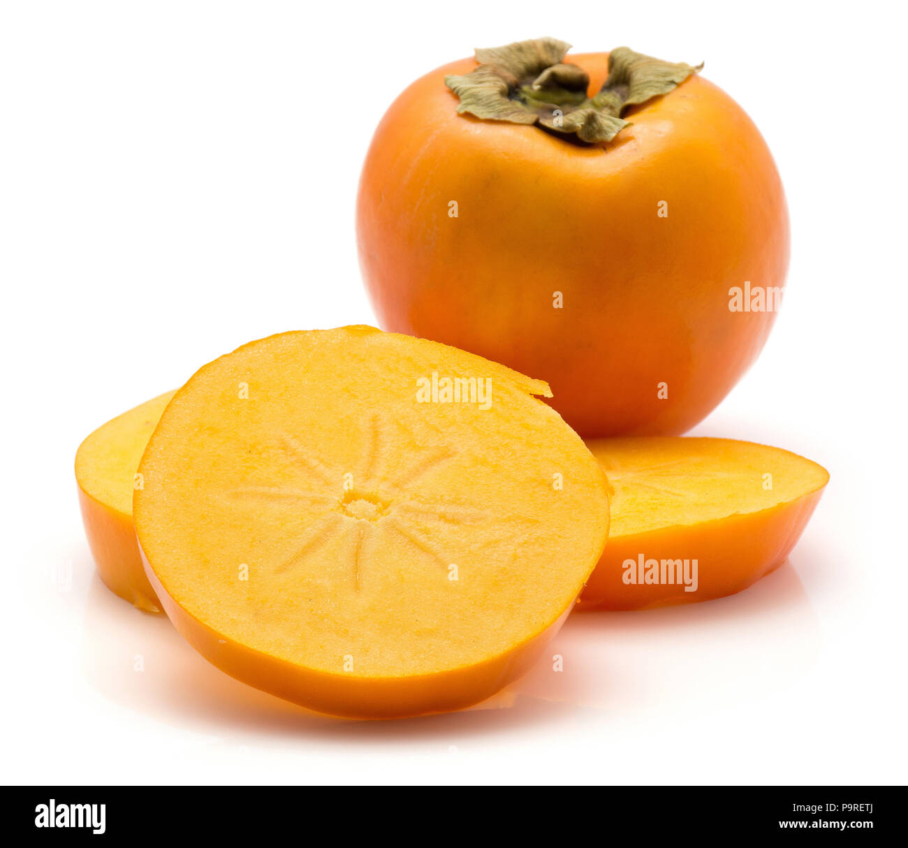 Persimmon Kaki isolated on white background one whole and three slices ...