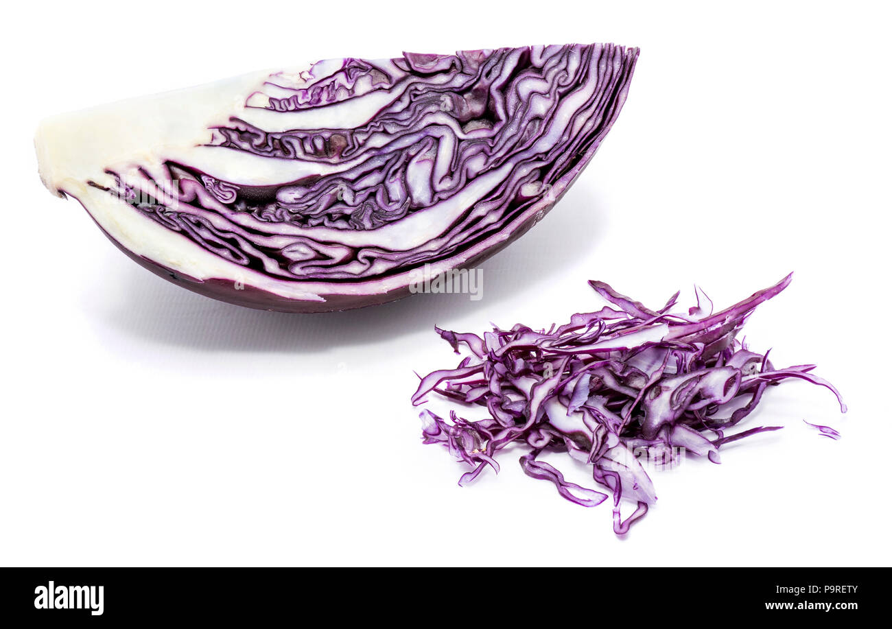 Sliced purple cabbage, one quarter and shredded or chopped heap ...