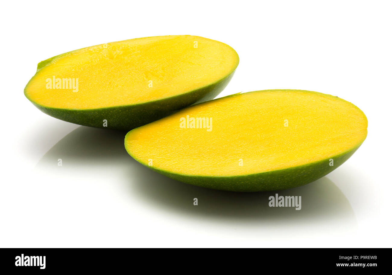 Sliced mango isolated on white background two halves Stock Photo - Alamy