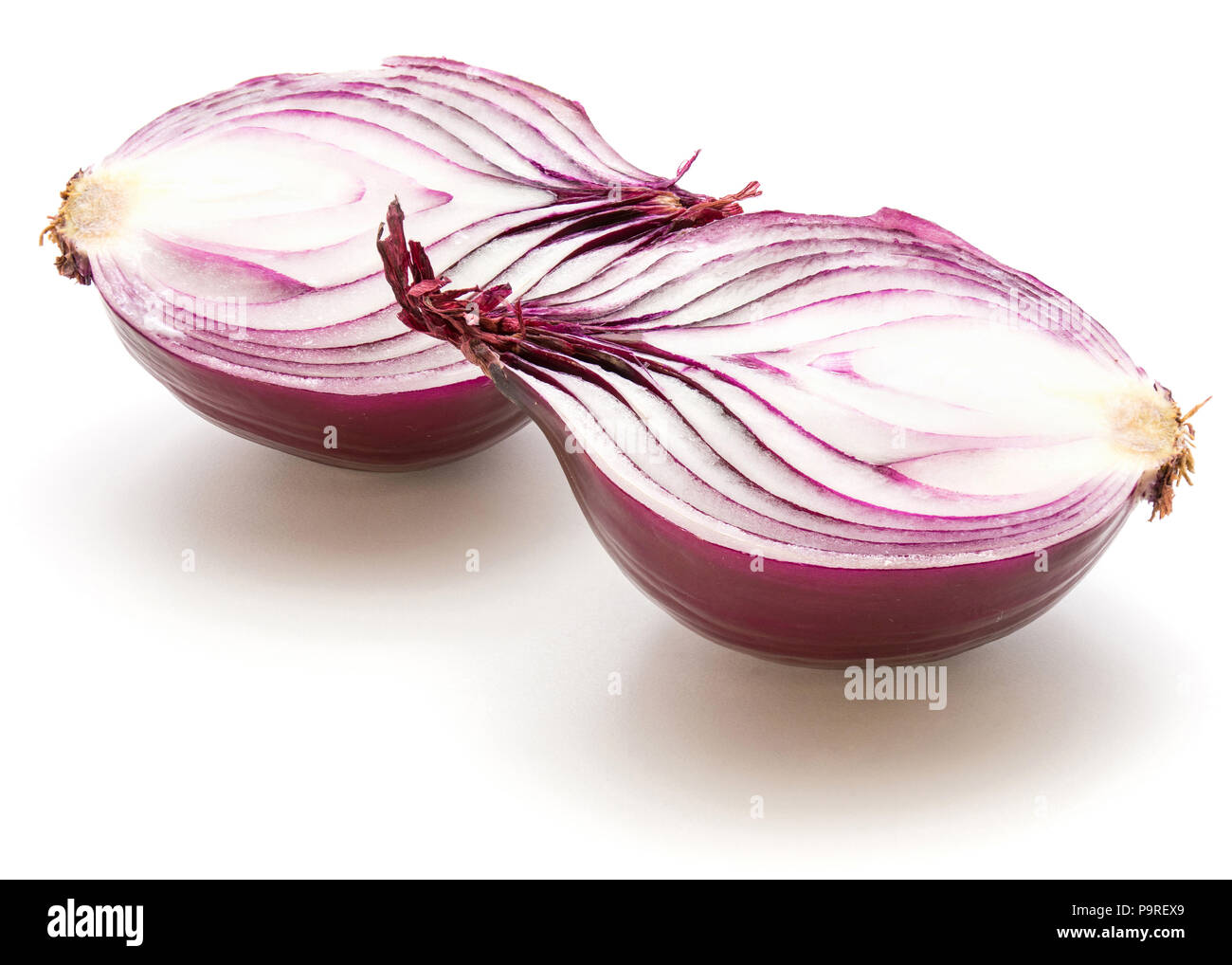 Two red onion halves isolated on white background Stock Photo - Alamy